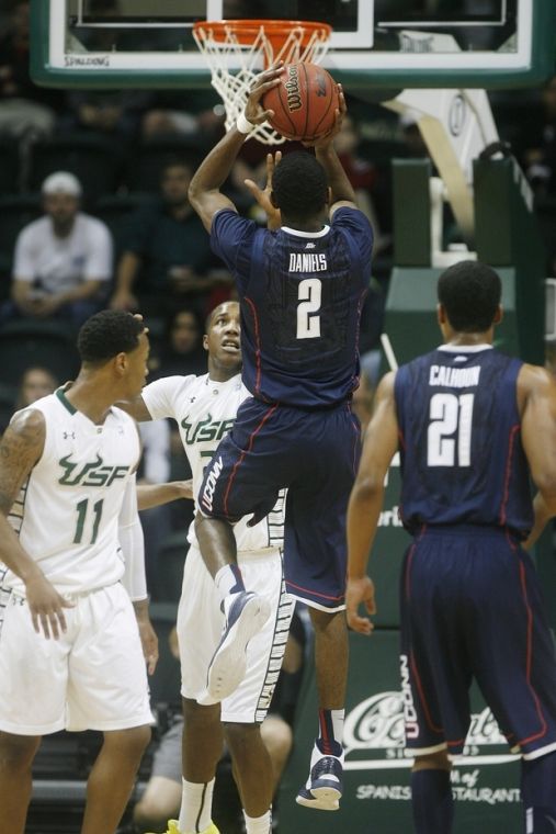 Brock scores 18 as South Florida beats UConn 65-51