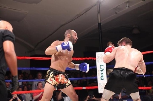 Wall Street banker's first fight ends in controversy