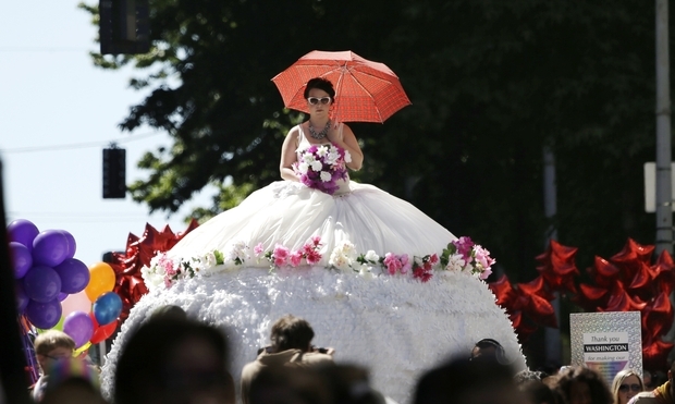 PHOTOS: Rainbows, cheer abound at pride parades