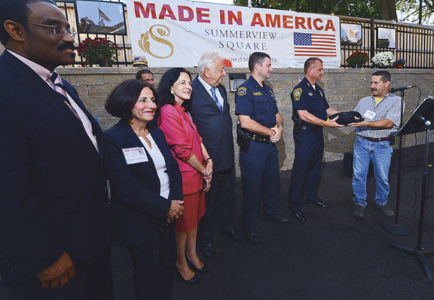 Officials mark 'topping off' of Summerview Square