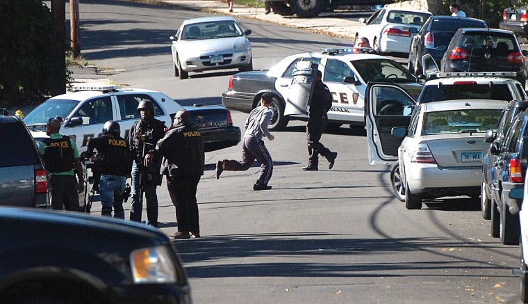 Gunman taken into custody after tense stand-off; police ID suspect