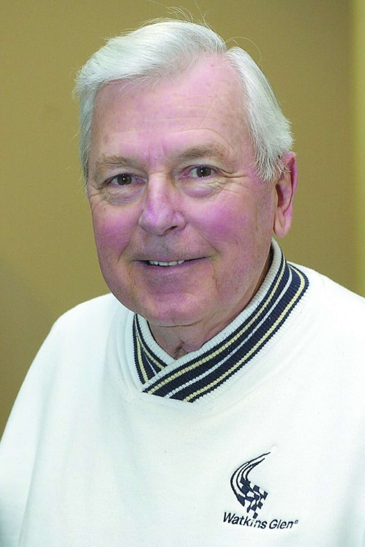 Charlie Mitchell, popular The Hour sports editor and auto racing writer ...