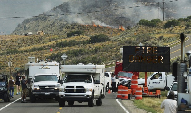 Utah fire destroys 13 homes near resort town