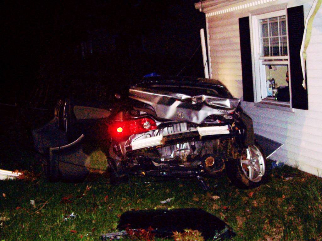 Car goes airborne and lands on roof of Stamford house