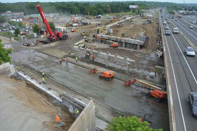 Photos: Workers put last pieces on new Route 8/25 bridge
