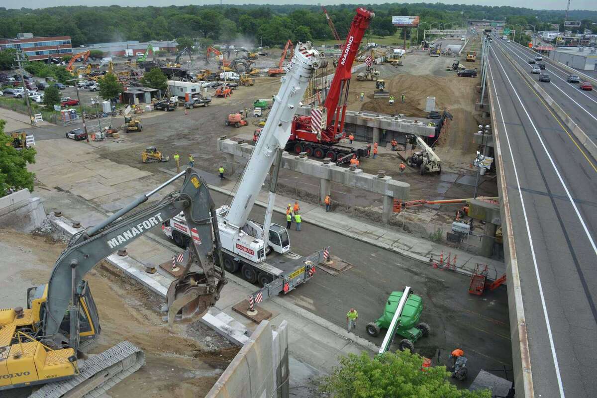 Photos: Workers put last pieces on new Route 8/25 bridge
