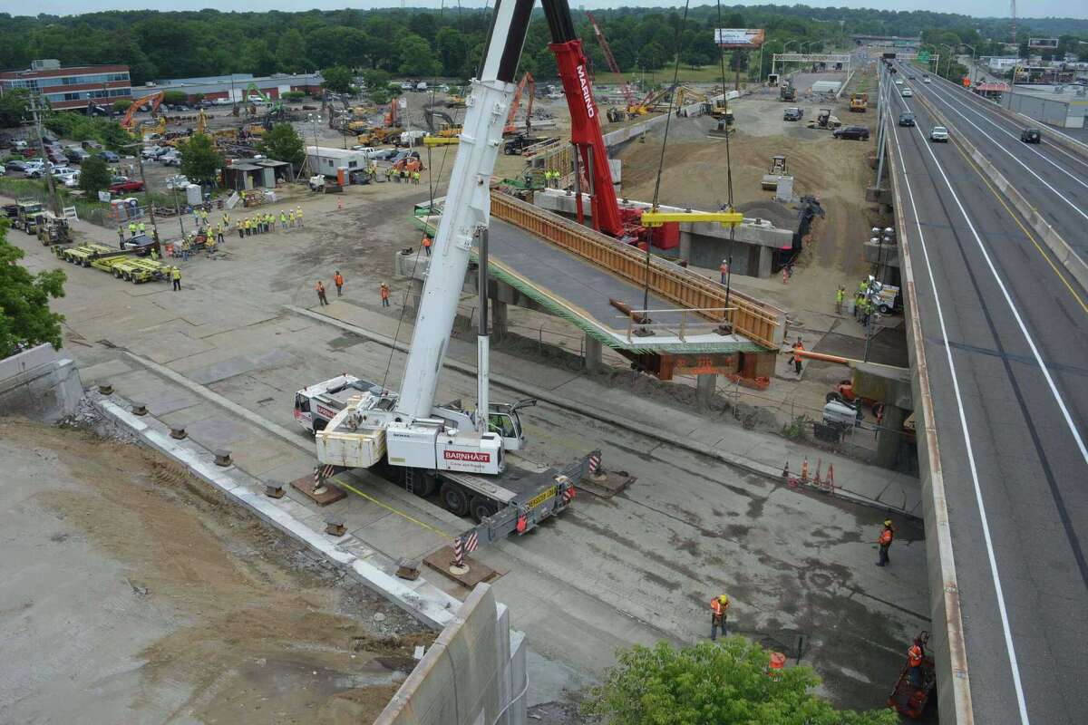 Photos: Workers put last pieces on new Route 8/25 bridge