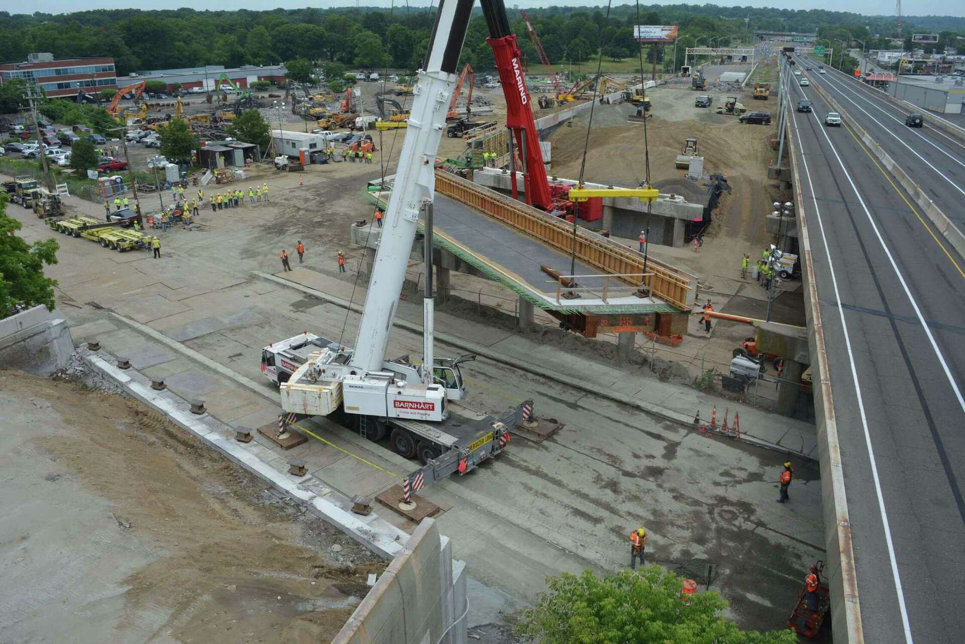 Photos: Workers put last pieces on new Route 8/25 bridge