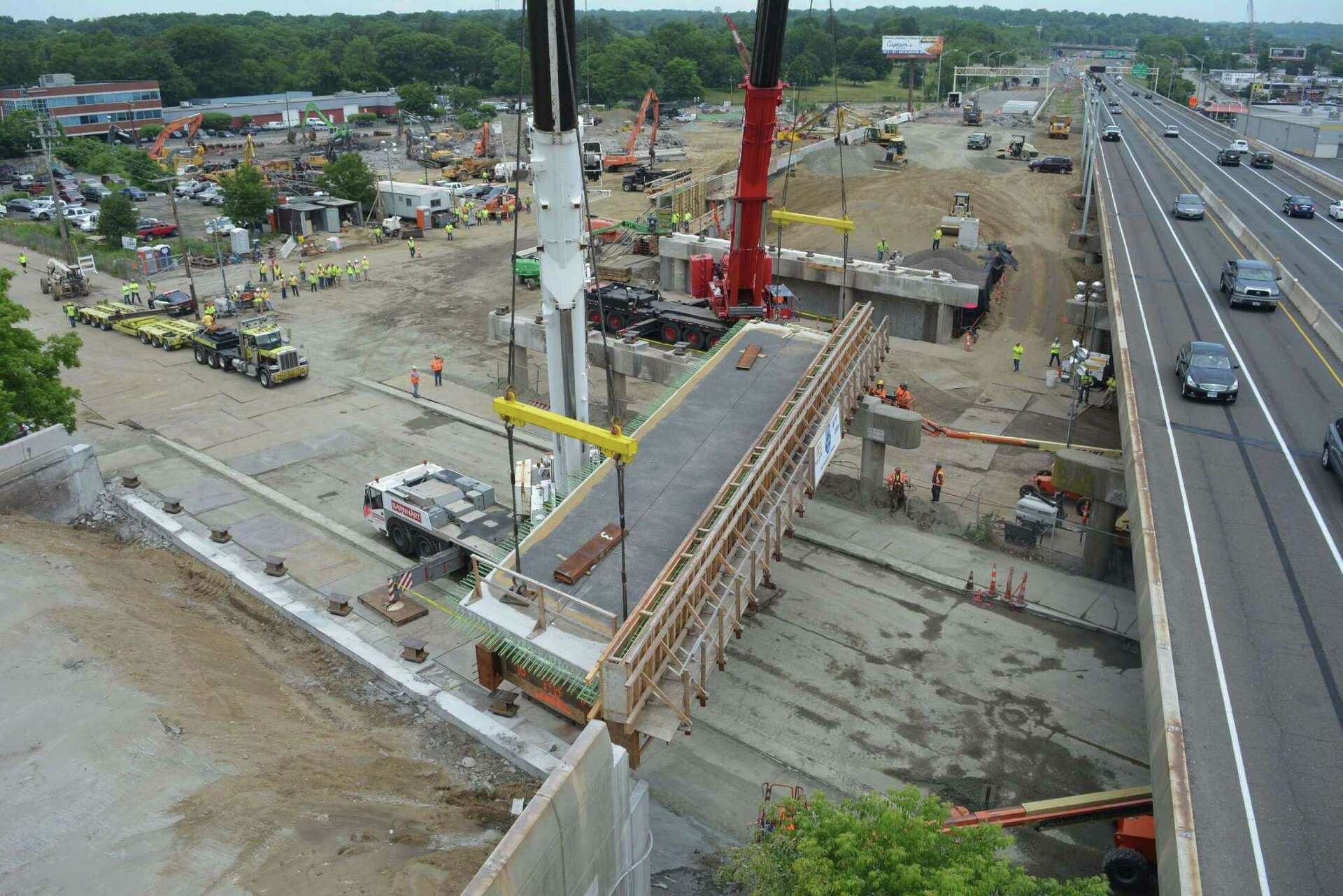 Photos: Workers put last pieces on new Route 8/25 bridge