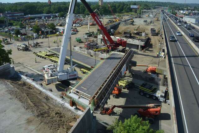 Photos: Workers put last pieces on new Route 8/25 bridge