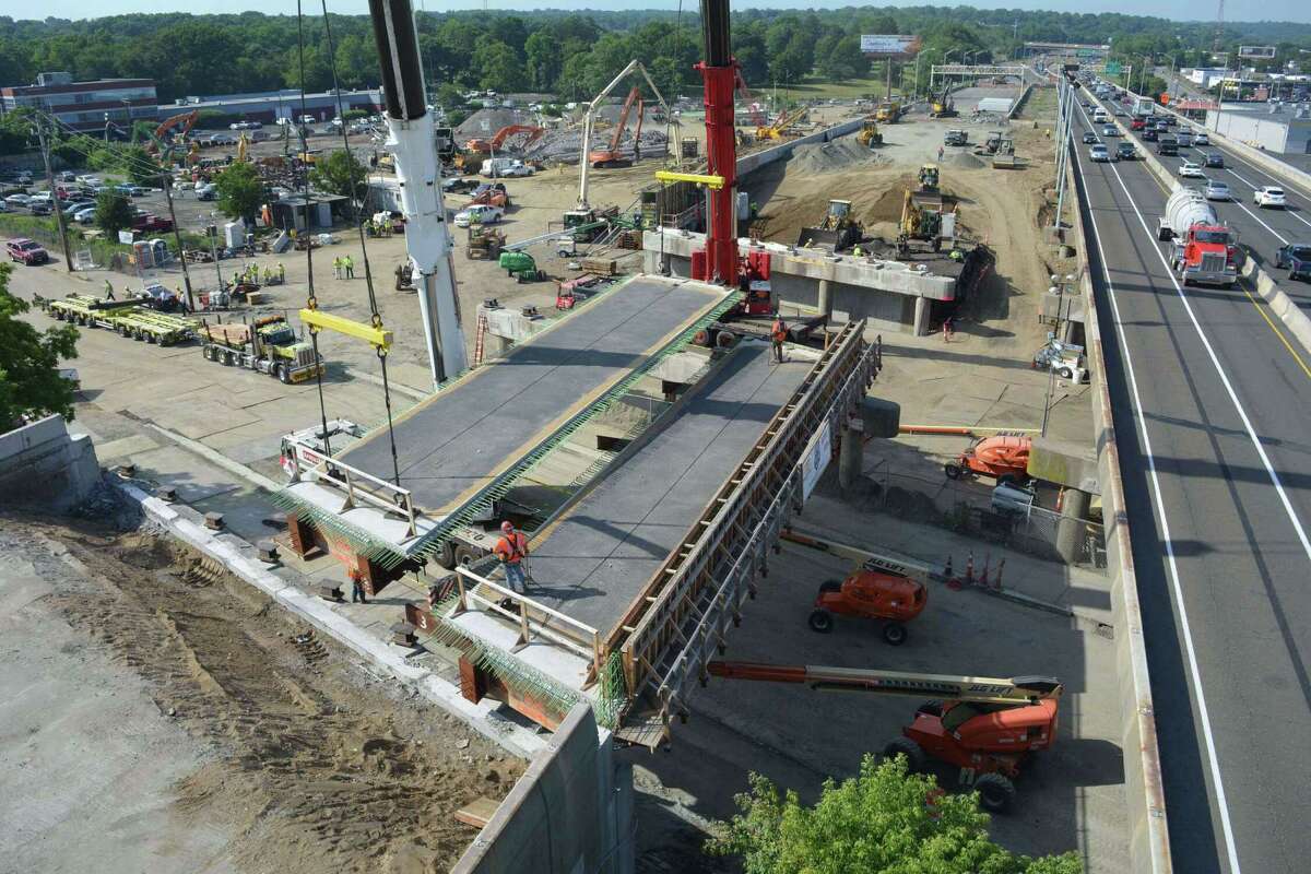 Photos: Workers put last pieces on new Route 8/25 bridge