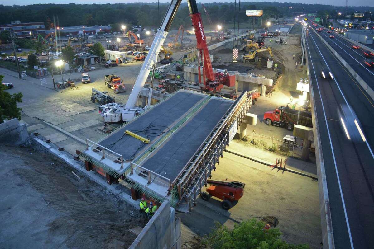 Photos: Workers put last pieces on new Route 8/25 bridge