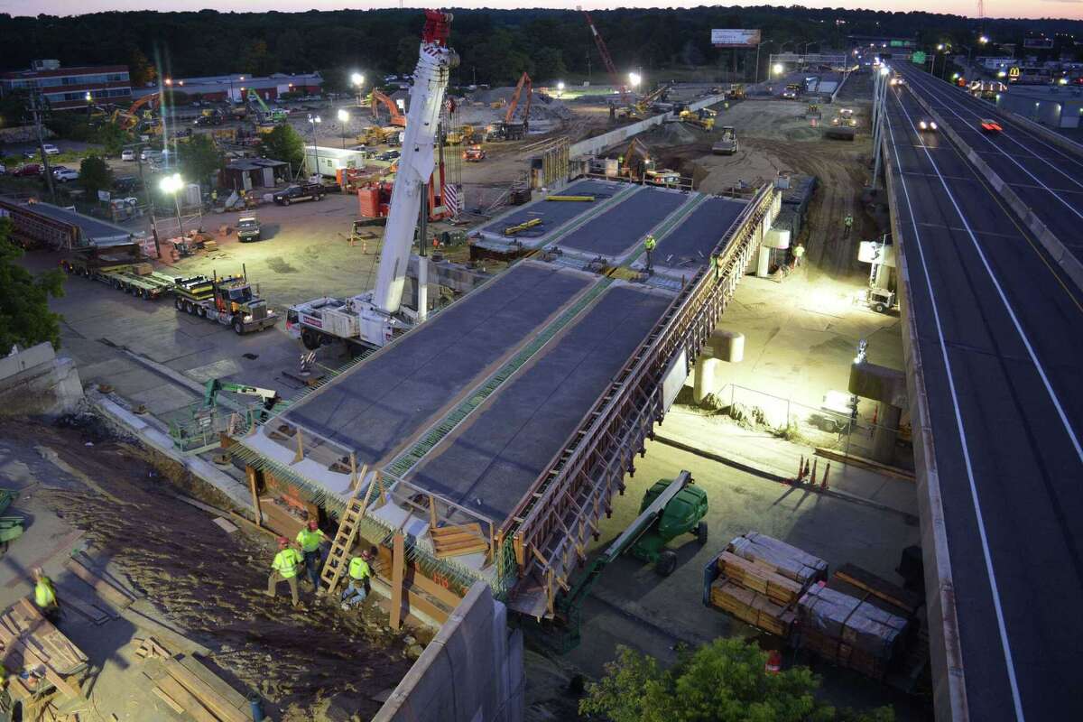 Photos: Workers put last pieces on new Route 8/25 bridge