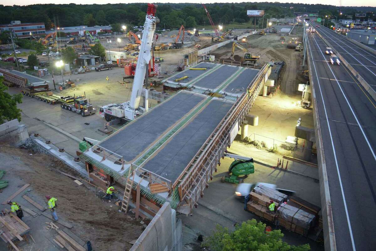 Photos: Workers put last pieces on new Route 8/25 bridge