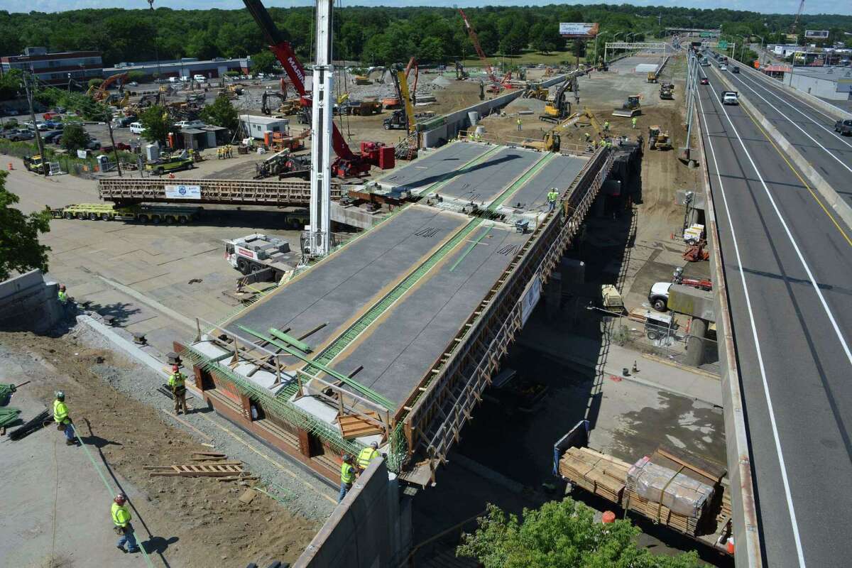 Photos: Workers put last pieces on new Route 8/25 bridge