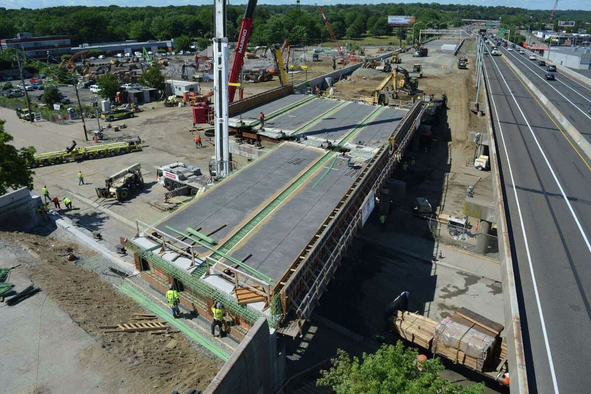 Photos: Workers put last pieces on new Route 8/25 bridge