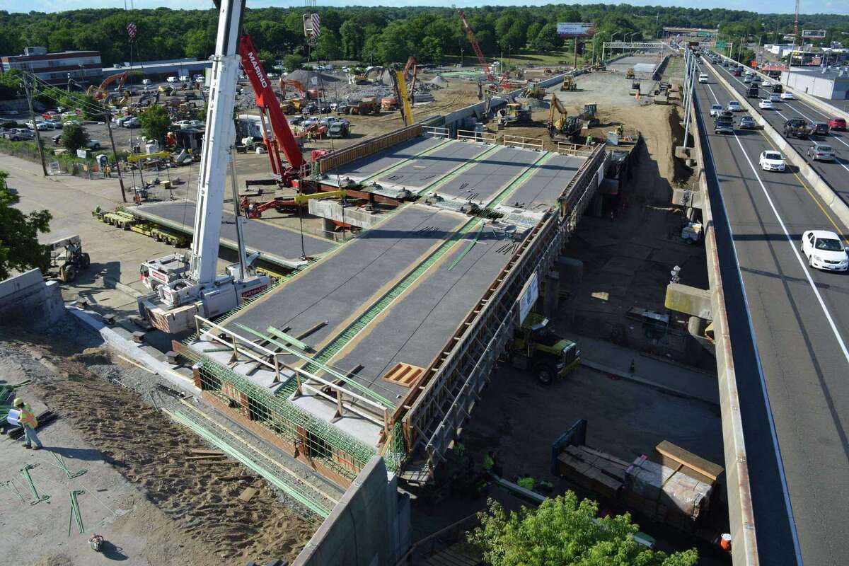 Photos: Workers put last pieces on new Route 8/25 bridge
