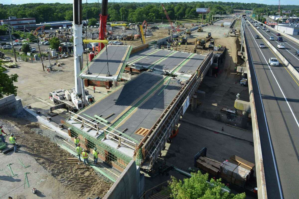 Photos: Workers put last pieces on new Route 8/25 bridge