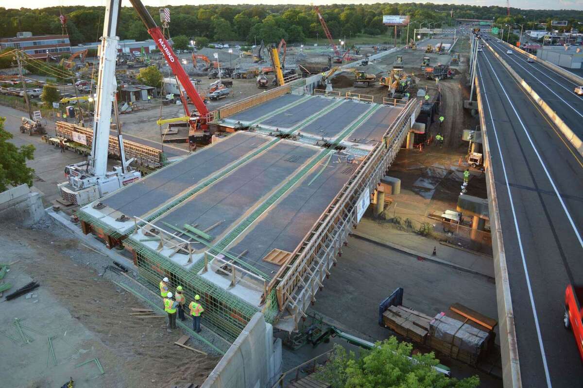 Photos: Workers put last pieces on new Route 8/25 bridge