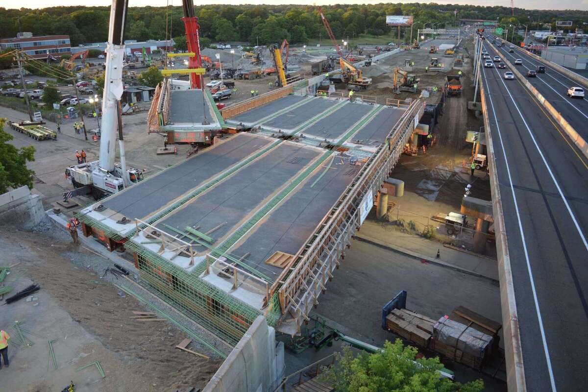 Photos: Workers put last pieces on new Route 8/25 bridge