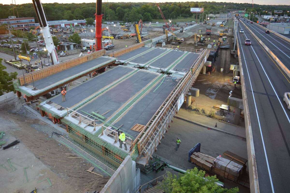 Photos: Workers put last pieces on new Route 8/25 bridge