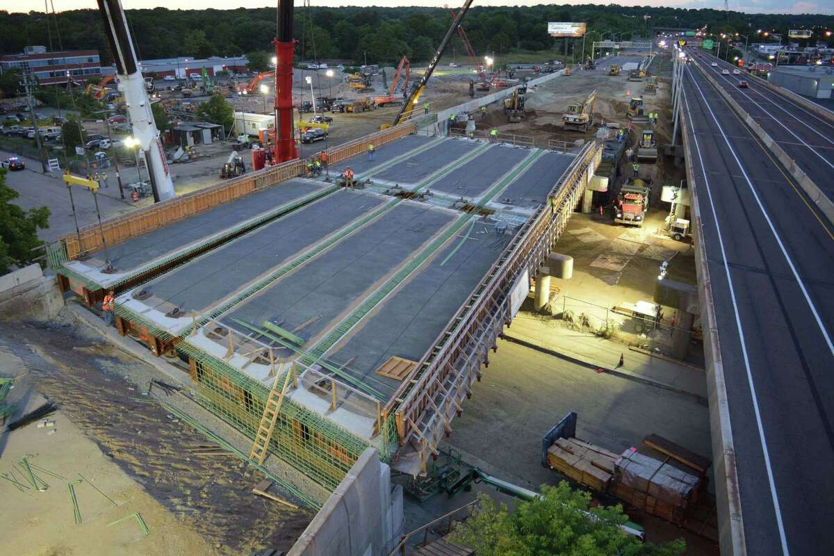 Photos: Workers put last pieces on new Route 8/25 bridge