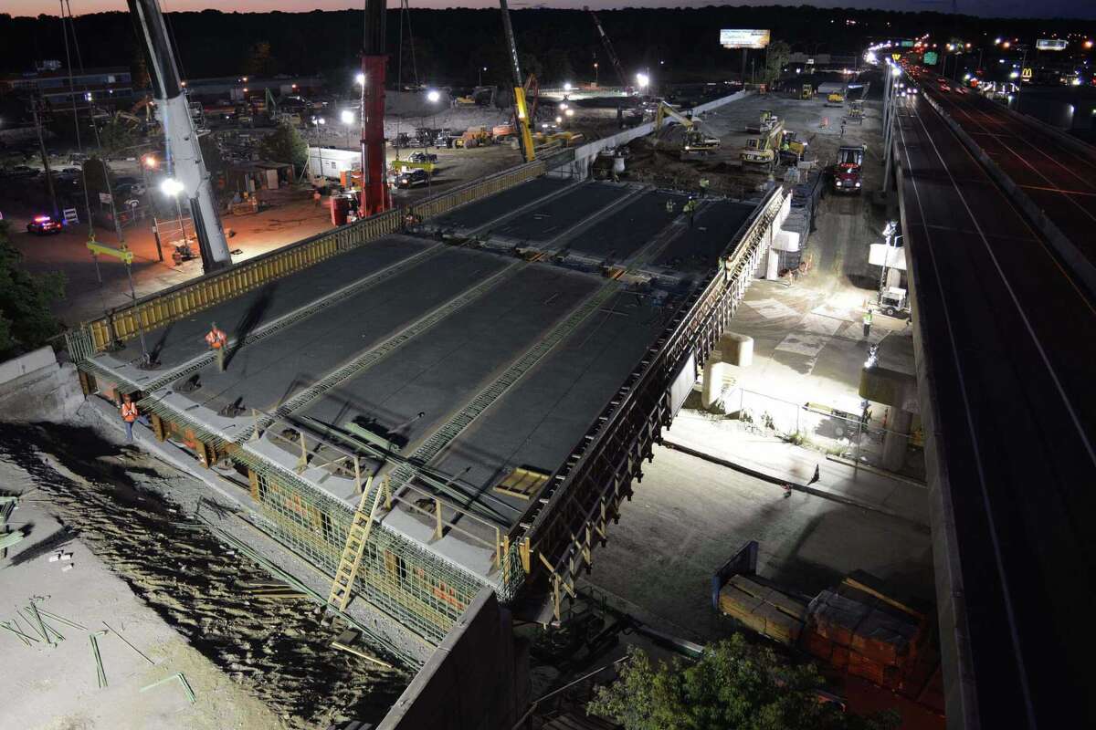 Photos: Workers put last pieces on new Route 8/25 bridge