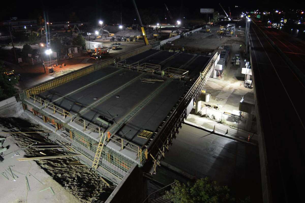 Photos: Workers put last pieces on new Route 8/25 bridge