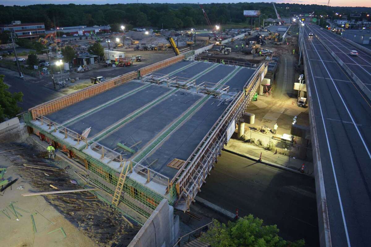 Photos: Workers put last pieces on new Route 8/25 bridge