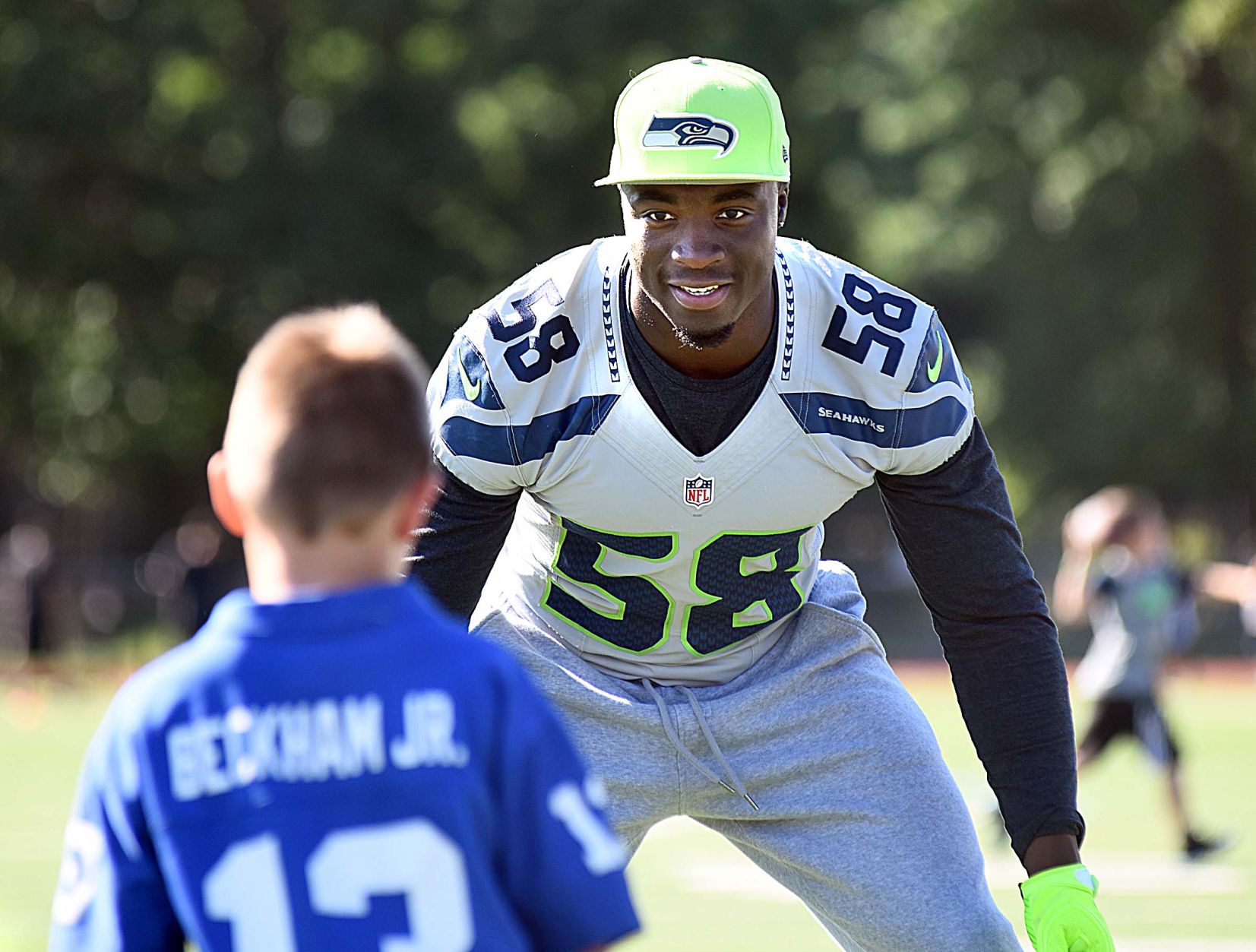 Norwalk's Pierre-Louis gives back with youth football camp