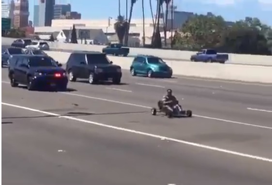 Video: Man evades police on go-kart on California highway as crowd cheers