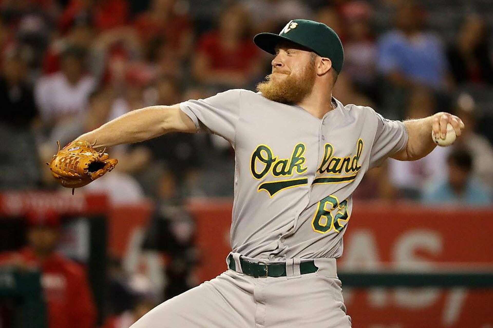 Young A's fan asks passerby to play baseball, is unaware the man is ...