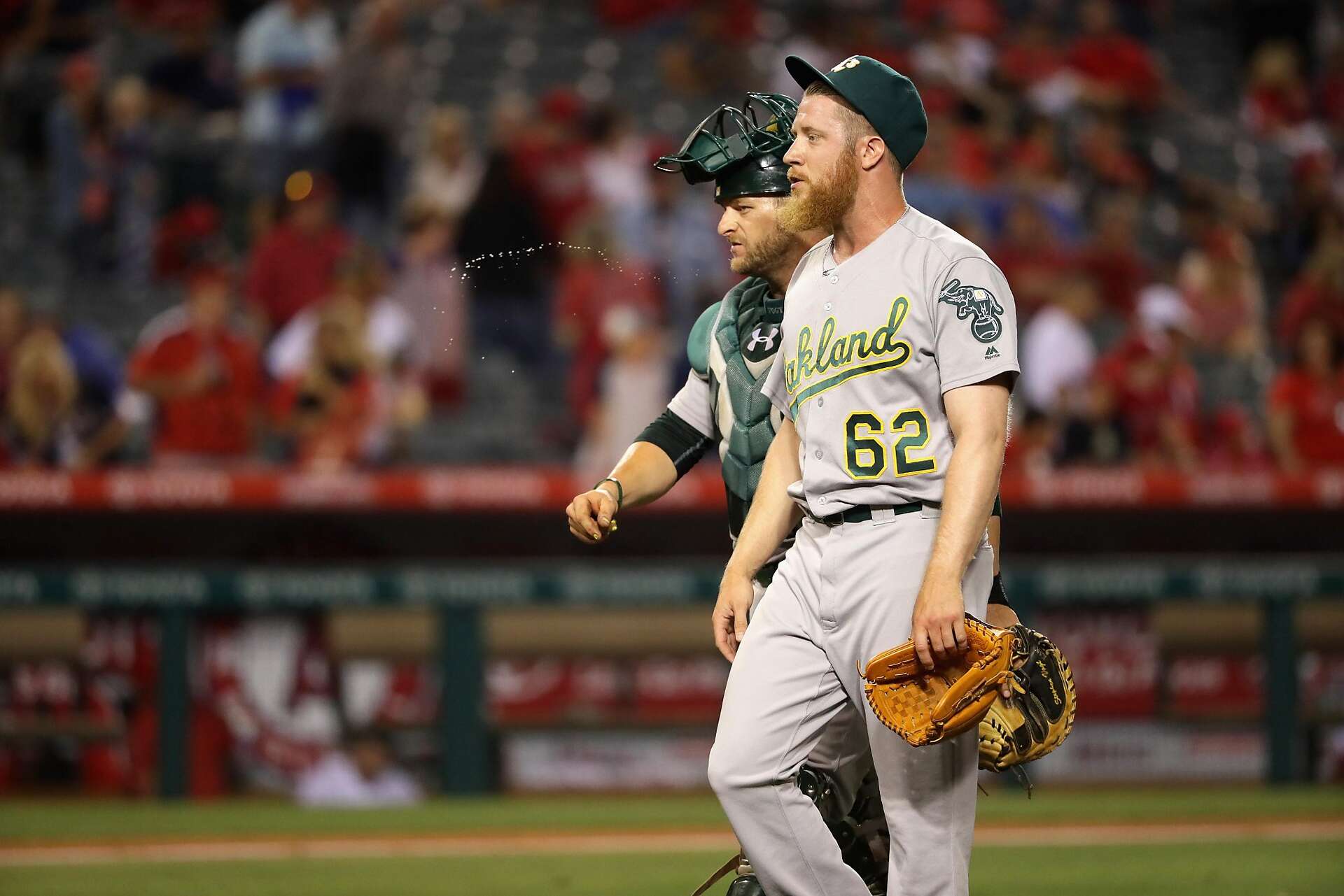 Young A's fan asks passerby to play baseball, is unaware the man is ...
