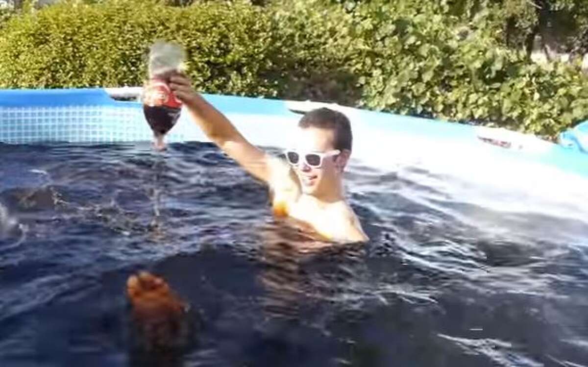 Video of man jumping into pool full of Coca-Cola goes viral on YouTube