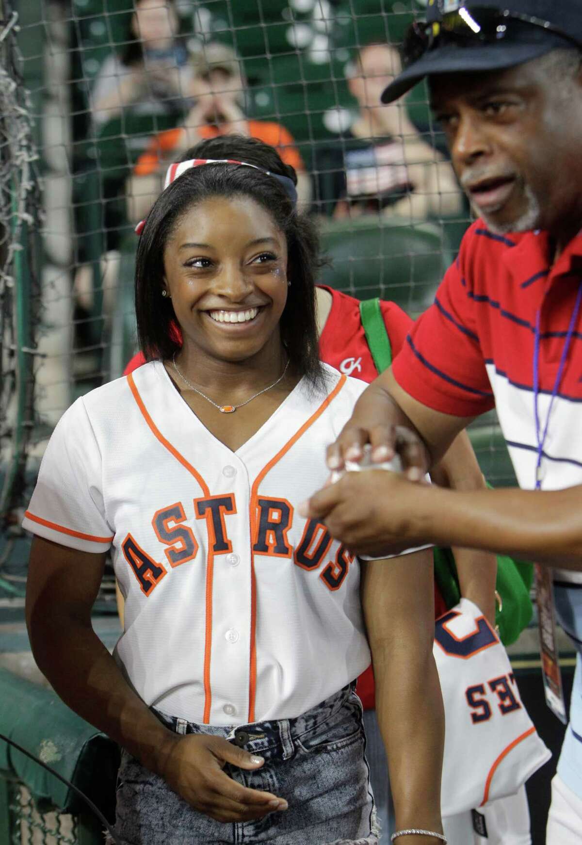 Simone Biles throws out Astros first pitch in style