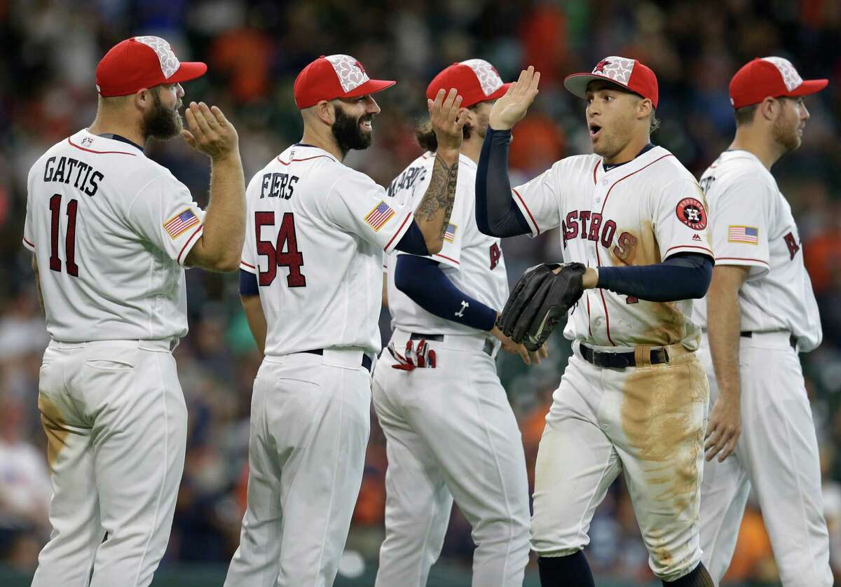 Simone Biles throws out Astros first pitch in style