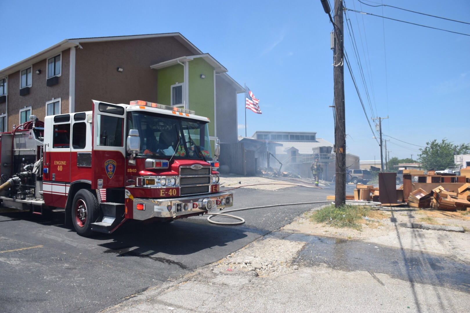More than a dozen evacuated as crews battle motel fire on Northeast Side