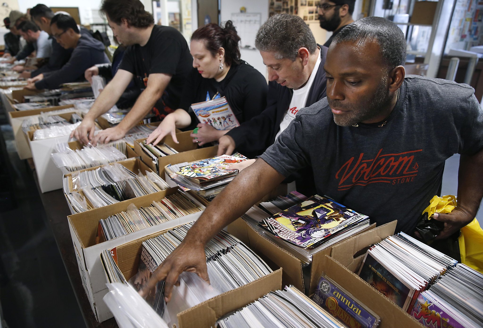 Comic book fans and collectors turn out for library sale