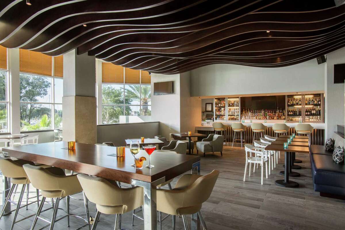 Photo: New Texas-shaped pool at Marriott Marquis is lit up at night for ...