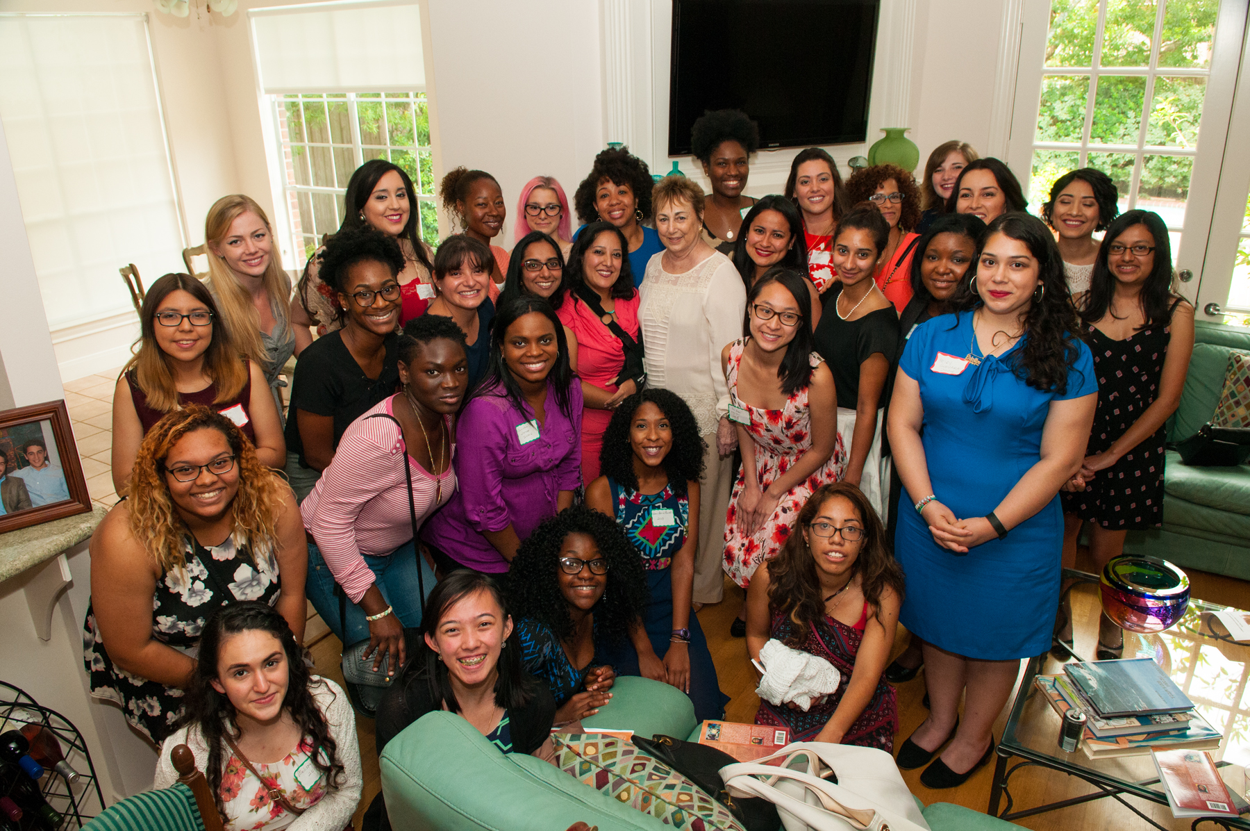 She treated 150 low-income girls like daughters