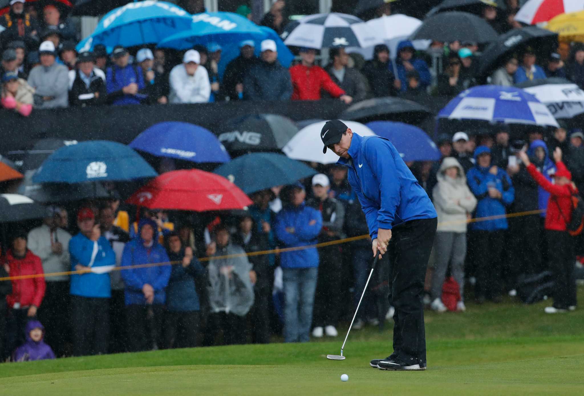British Open scores soar after afternoon rain, wind arrive