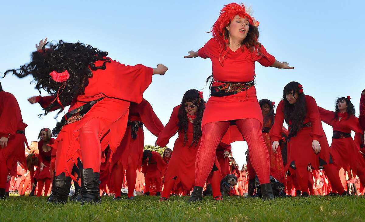 Thousands in red dresses recreate Kate Bush's 'Wuthering Heights'