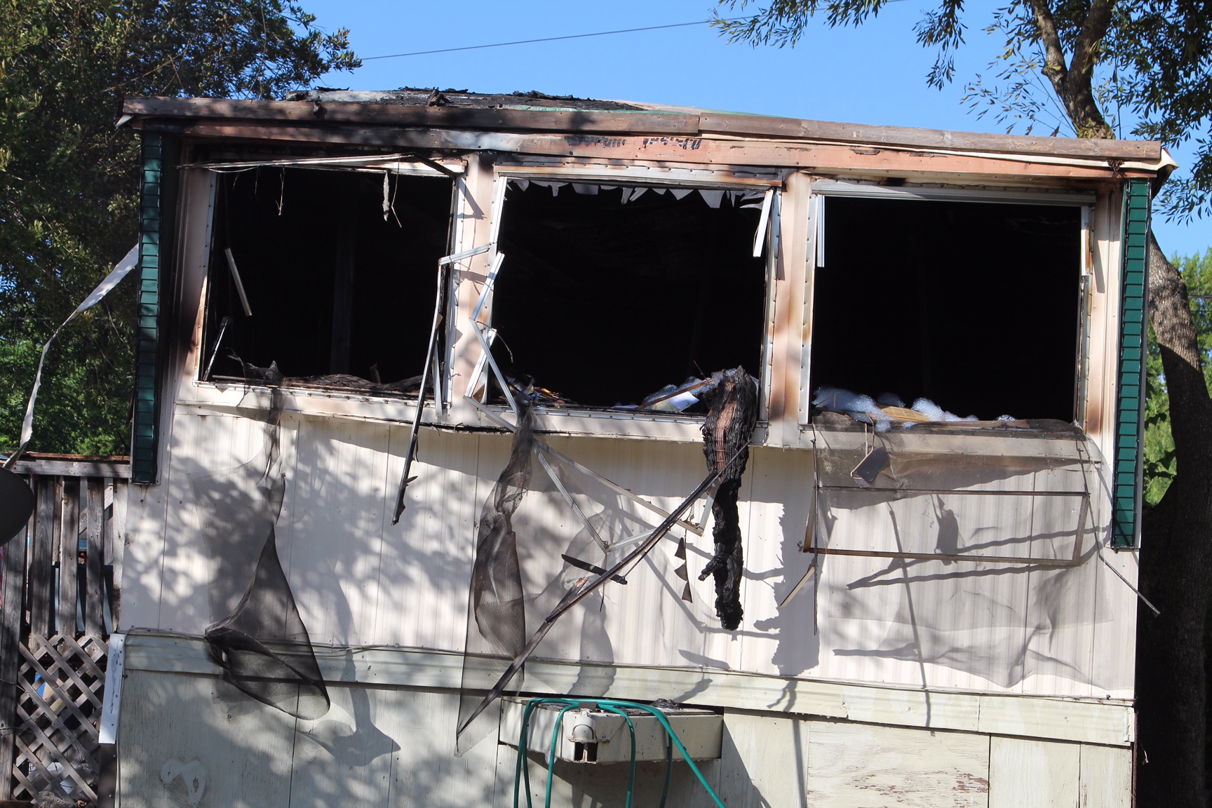 Trailer house considered total loss after fire on West Side