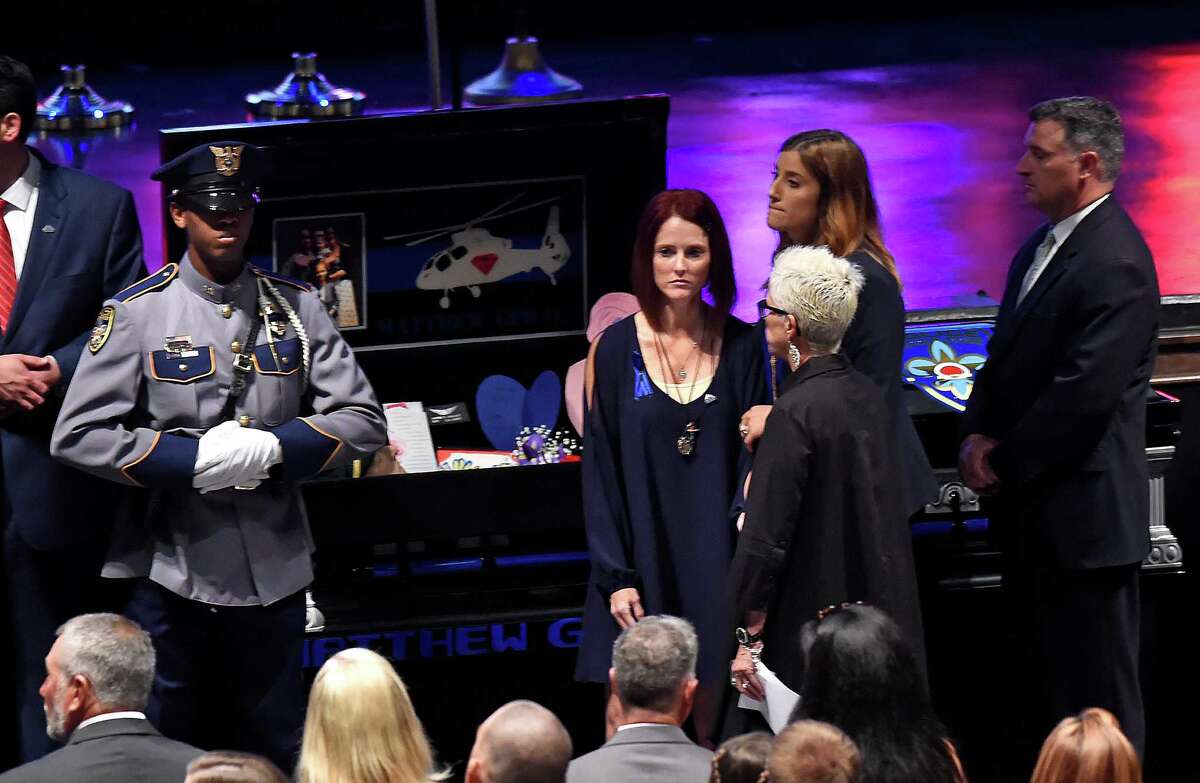 At Baton Rouge officer's funeral, calls for respect and unity