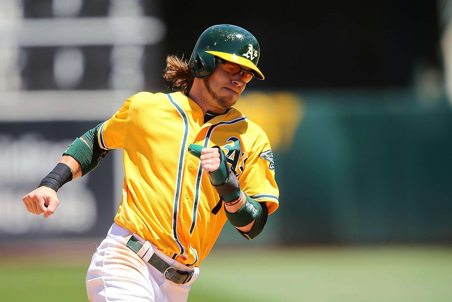 A’s Josh Reddick out with back issue