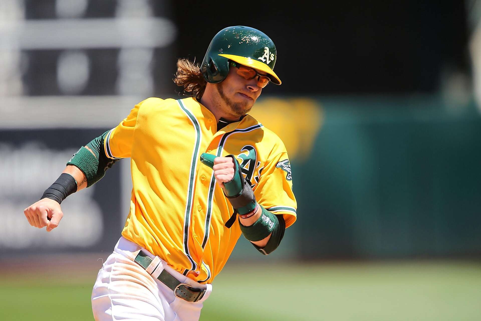 A’s Josh Reddick out with back issue