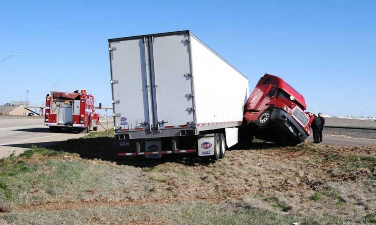 Wind gust causes truck to jackknife