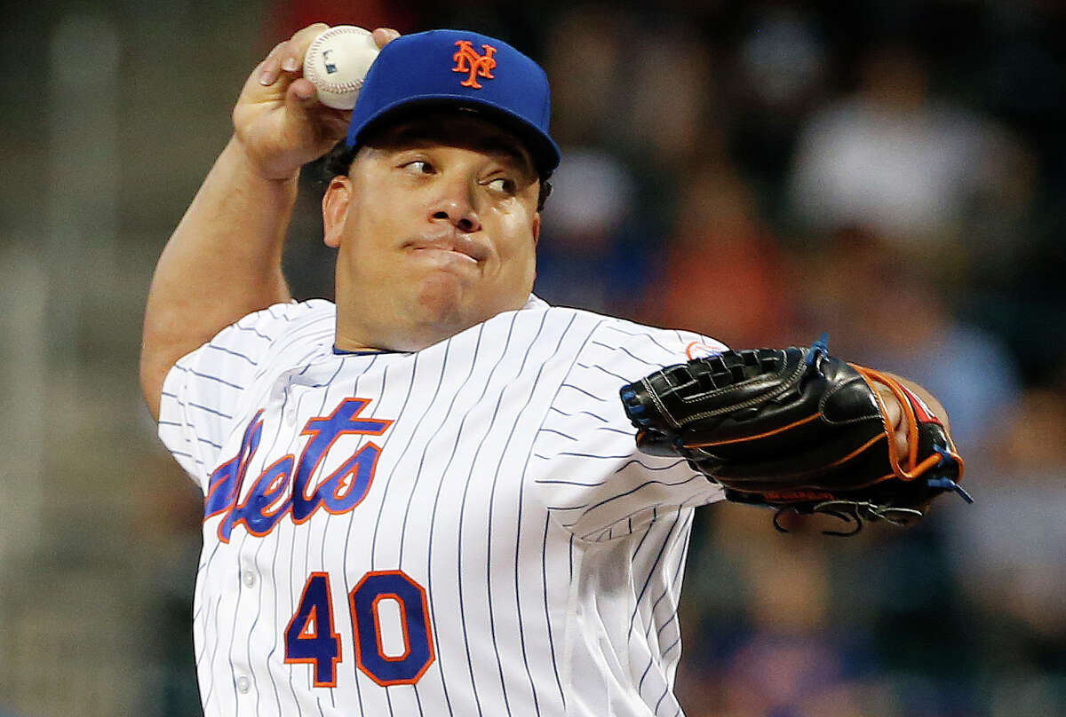 Colon leads Mets to doubleheader split