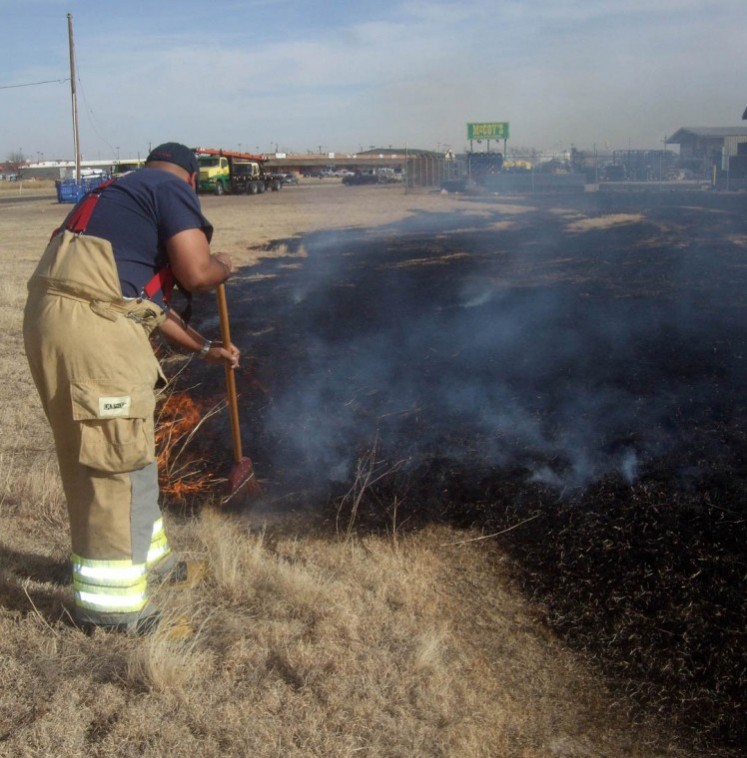 Dry, windy conditions spark grass fire