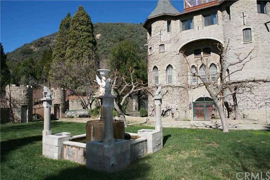 Castle with turrets and drawbridge on the market for $849,000 — in ...
